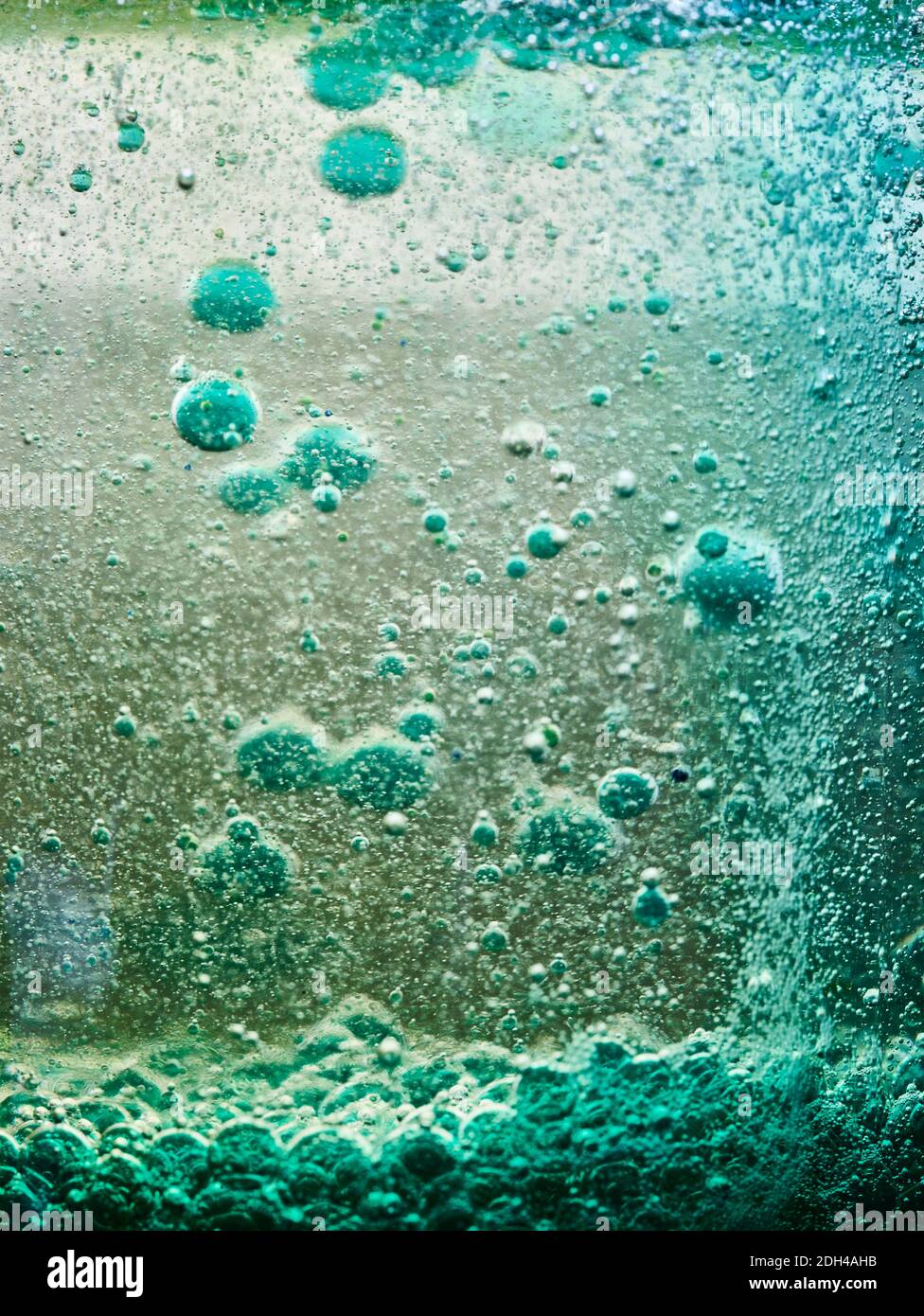 Bubbles forming textured colourful background formed by a simple ...