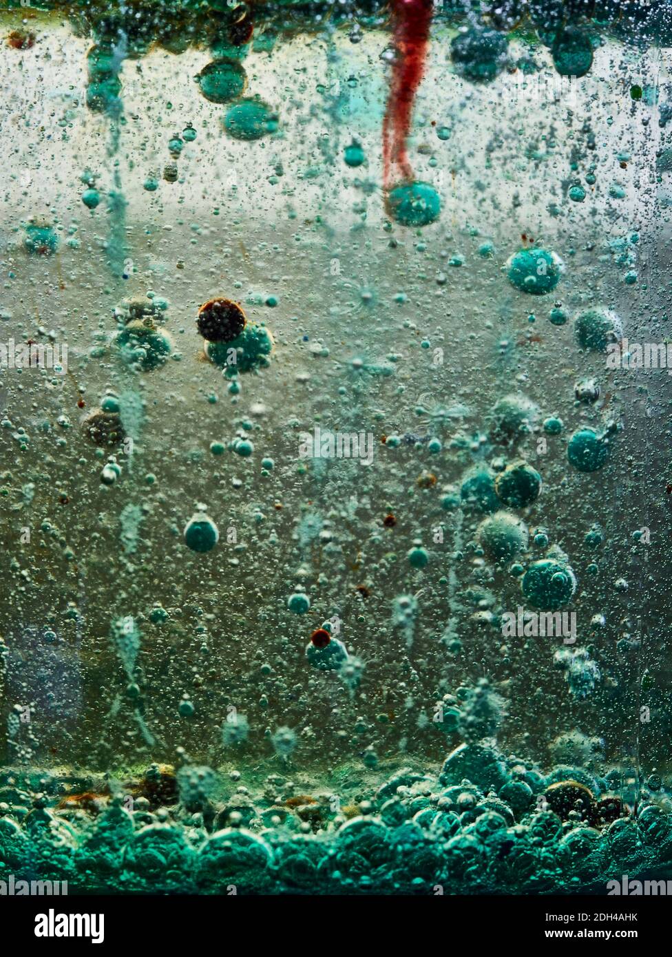 Bubbles forming textured colourful background formed by a simple ...
