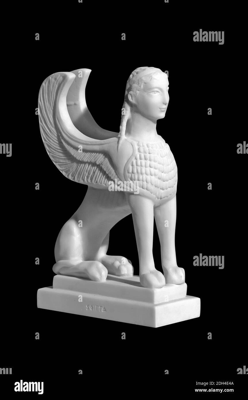 Statuette of a sphinx on a black background Stock Photo - Alamy