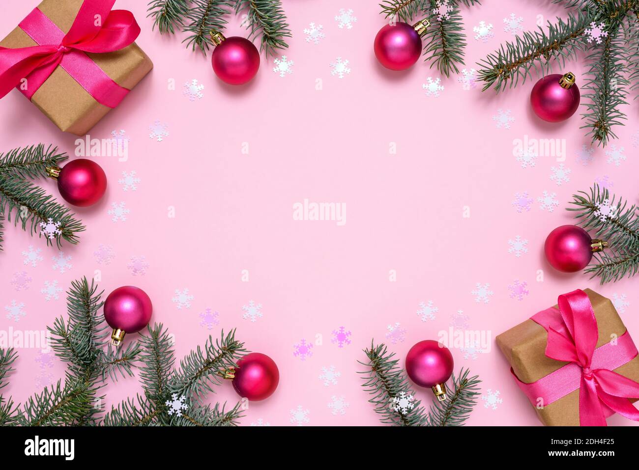 Christmas frame made of fir branches, Christmas ornaments and gift ...