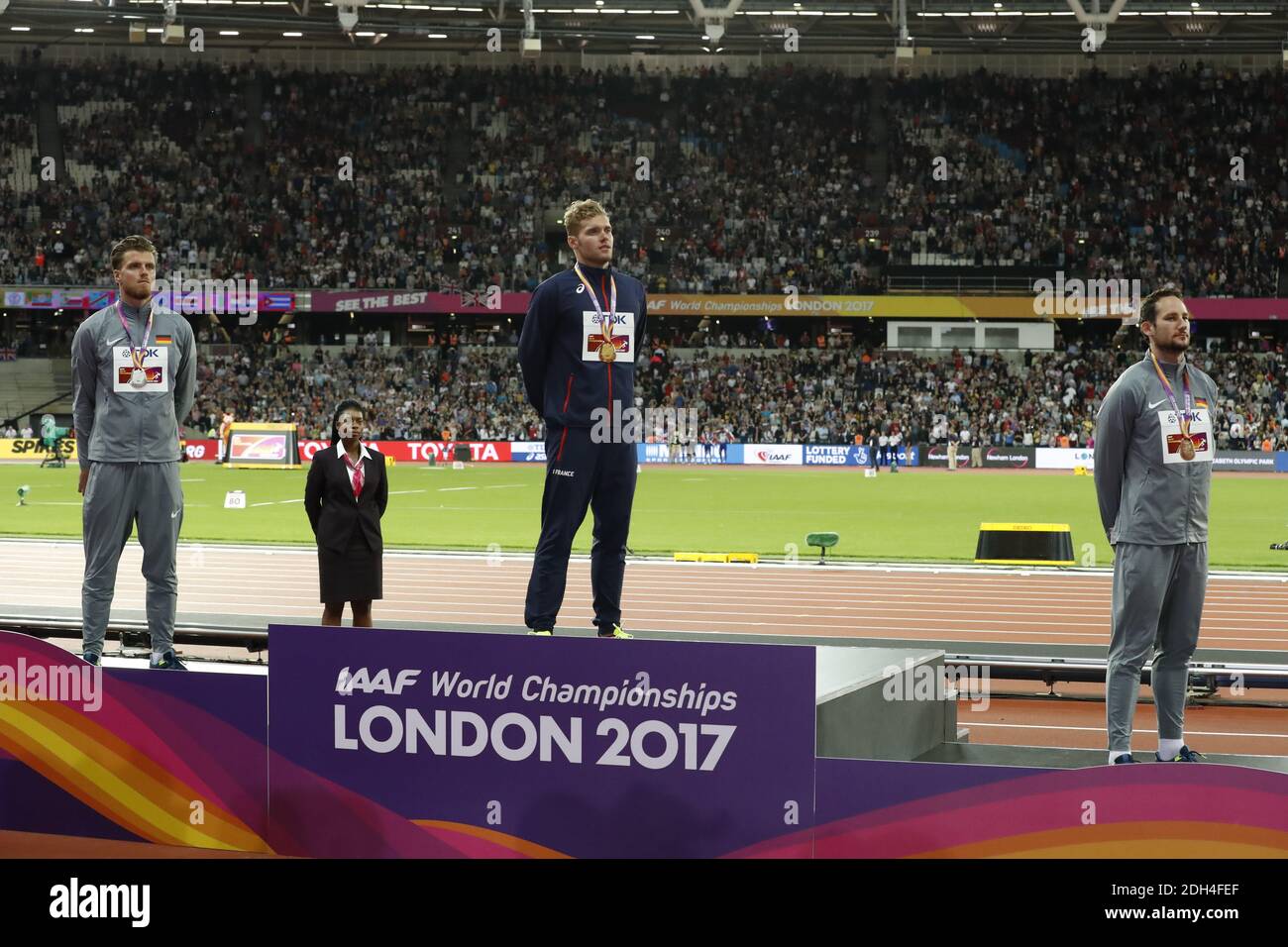France's Kevin Mayer receiving his gold medal after winning the ...