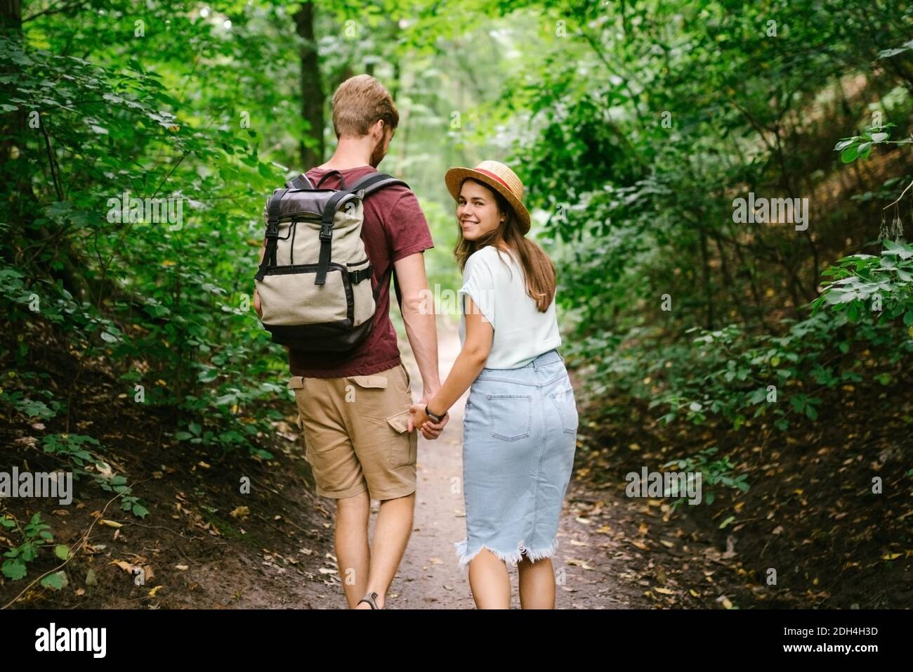 Couple walking together along path pathway hi-res stock photography and ...