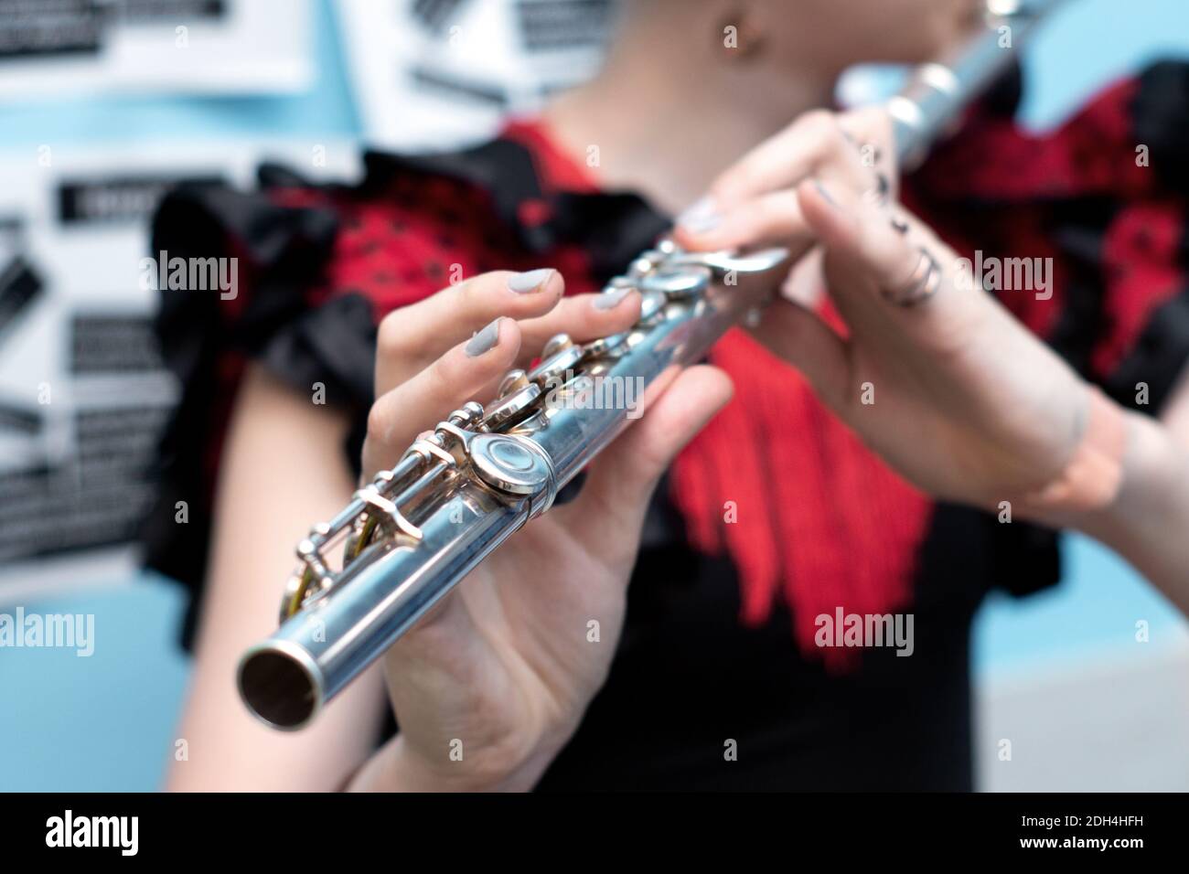 Young girl playing flute hi-res stock photography and images - Alamy