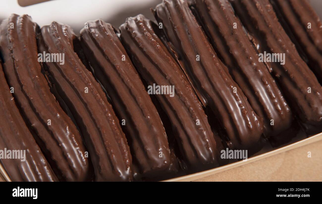 A closed up image of traditional Spanish fried dough churros with ...