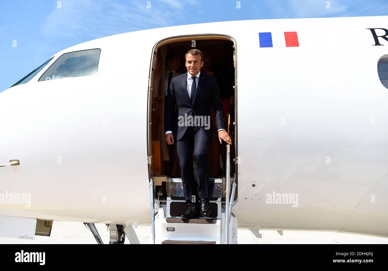 French President Emmanuel Macron disembarks the airplane upon arrival ...