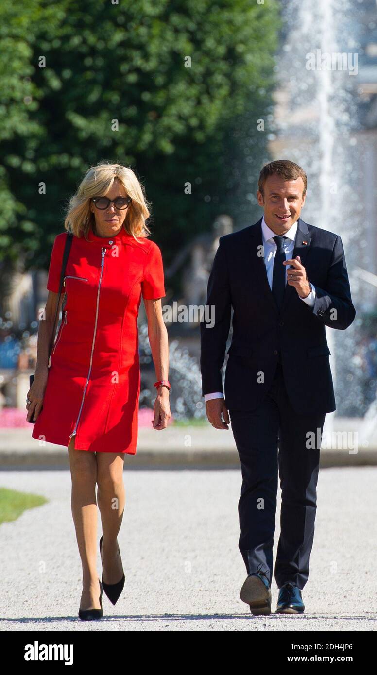 French President Emmanuel Macron (2ndL) and his wife Brigitte Macron (L ...