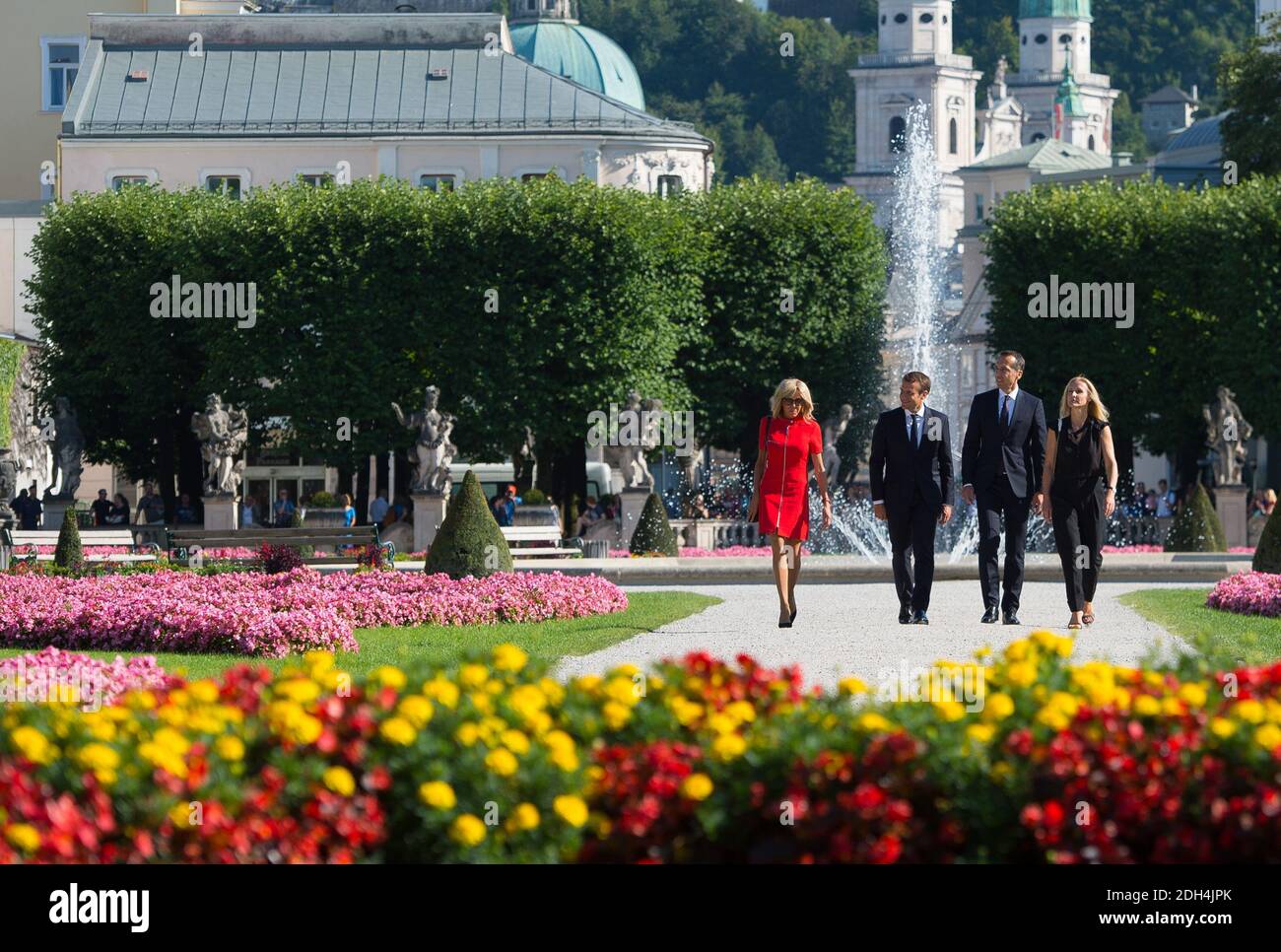 French President Emmanuel Macron (2ndL) and his wife Brigitte Macron (L ...