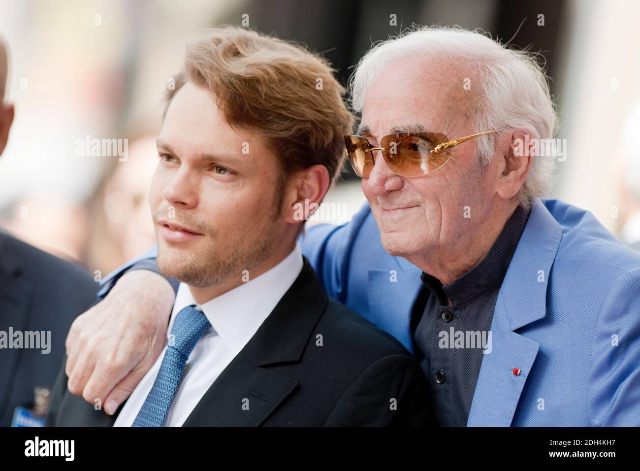 Charles Aznavour, posing with his son Nicolas, is honored with a star ...