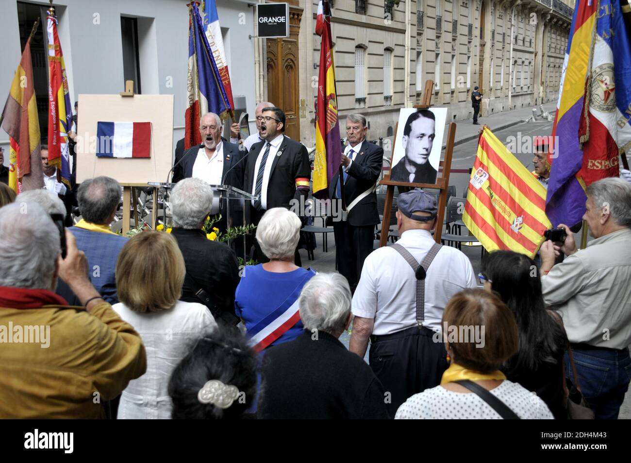 People hold Spain's republican flags as a plaque honoring Jose Maria ...