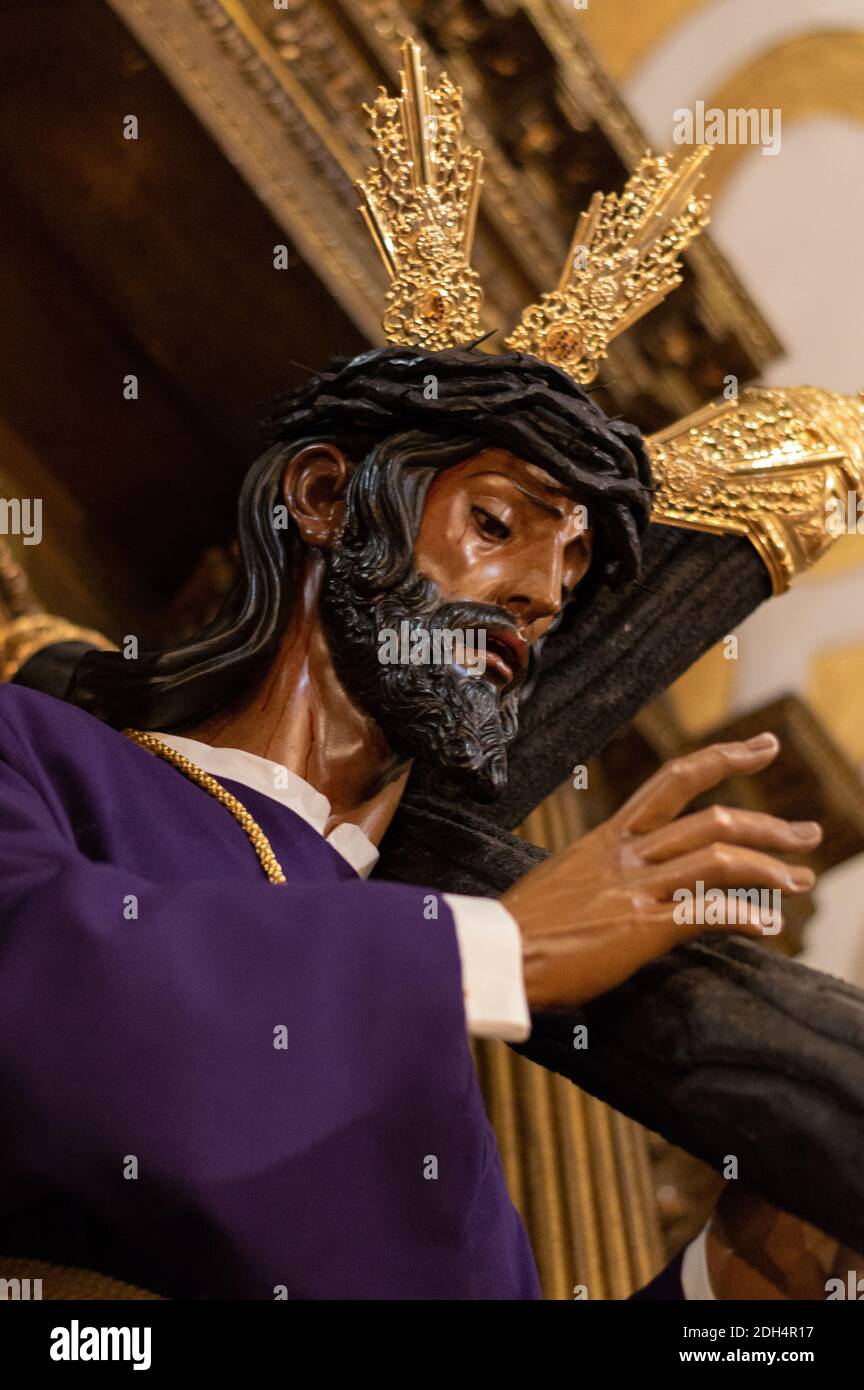 A vertical shot of Christ carrying the cross Stock Photo - Alamy