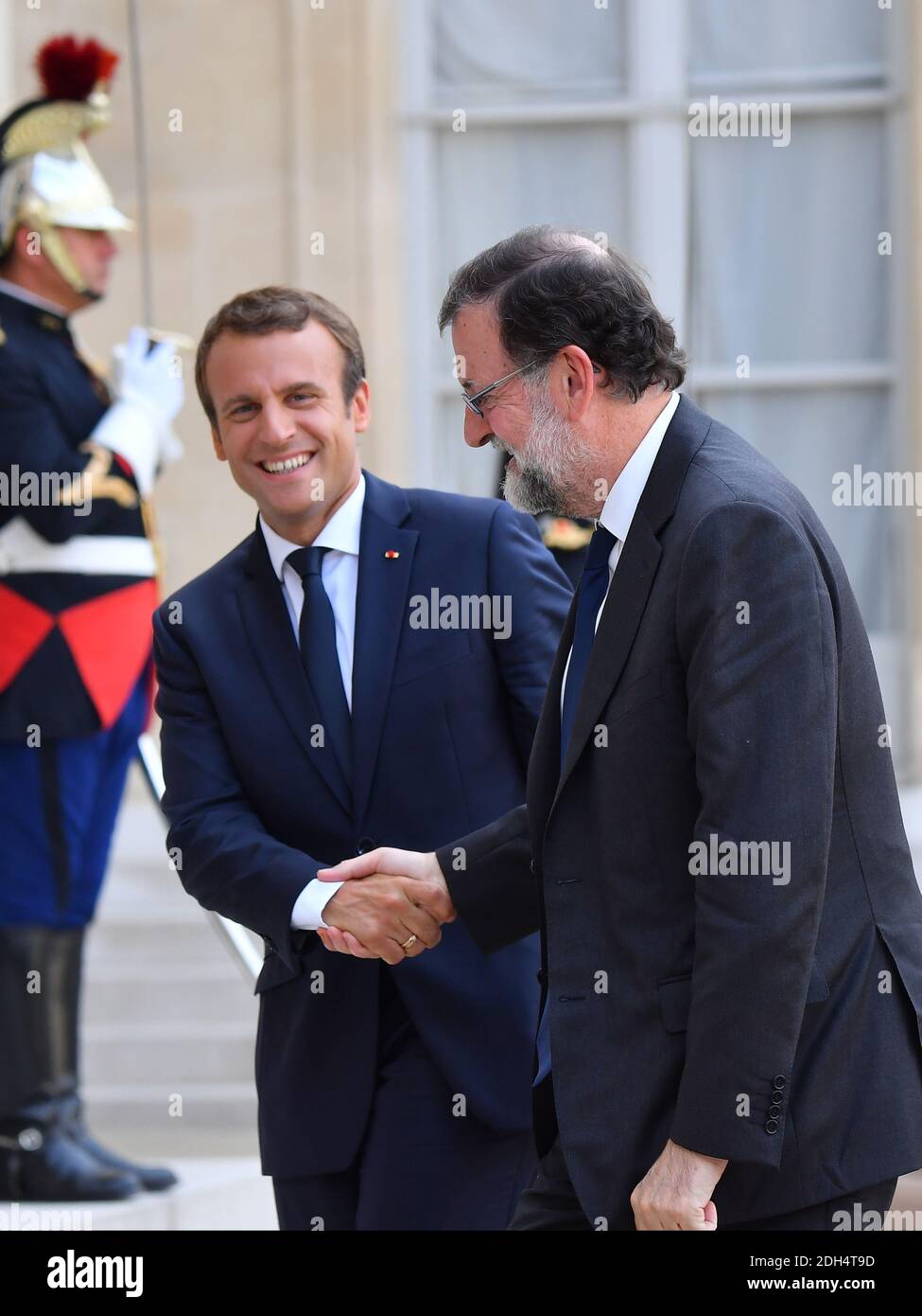 French president Emmanuel Macron shakes hands with Spanish prime ...