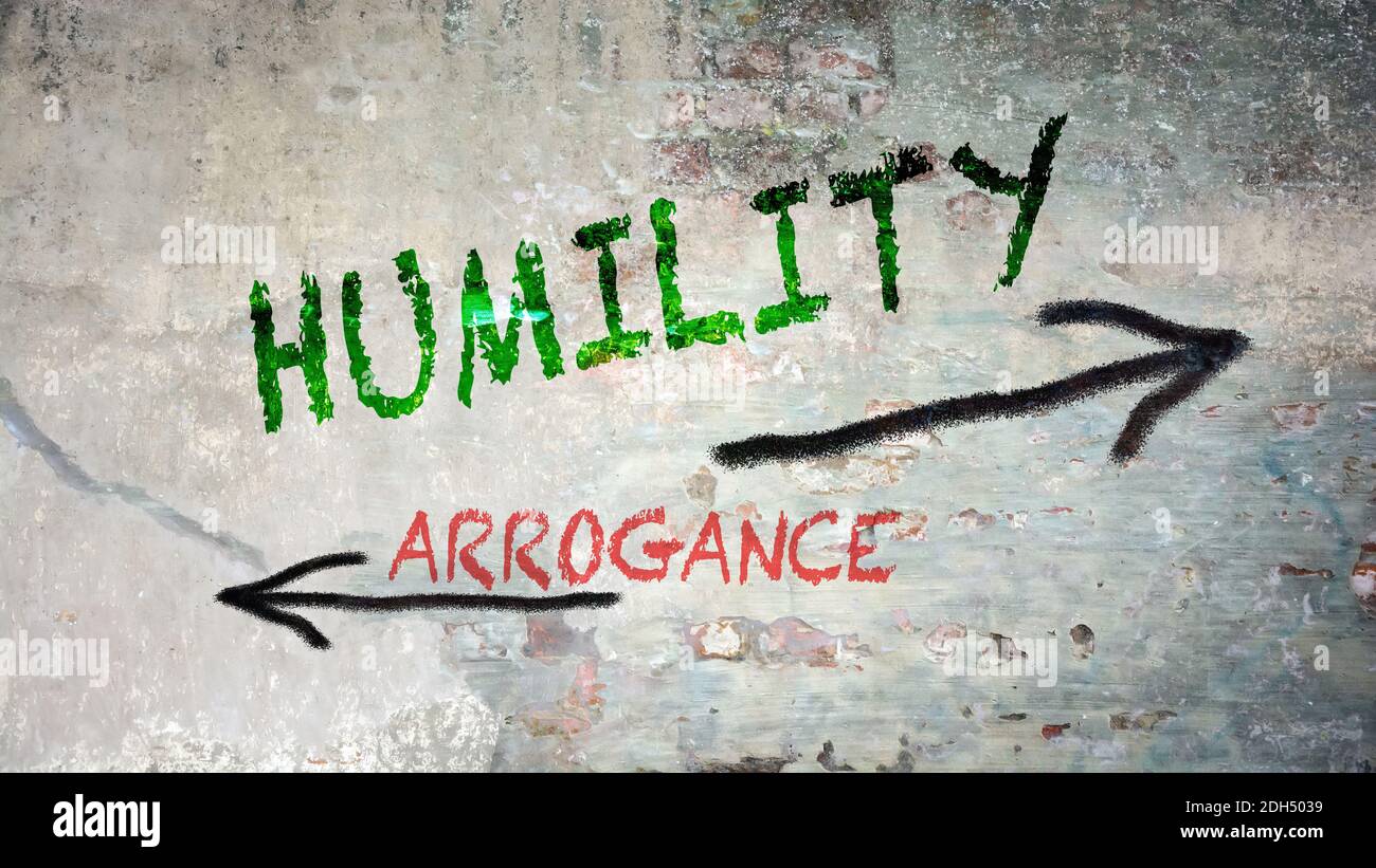 Street Sign to Humility versus Arrogance Stock Photo - Alamy
