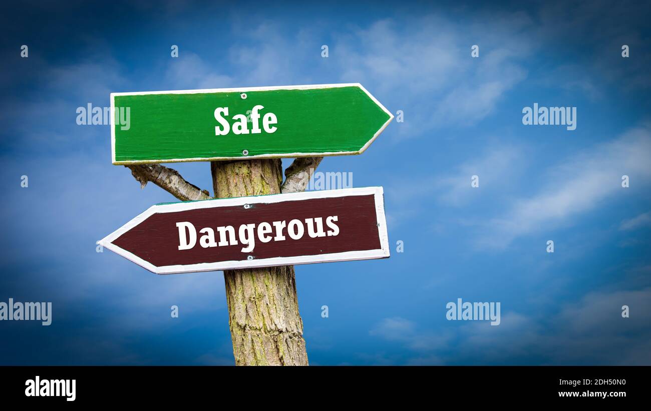 Street Sign Safe versus Dangerous Stock Photo - Alamy