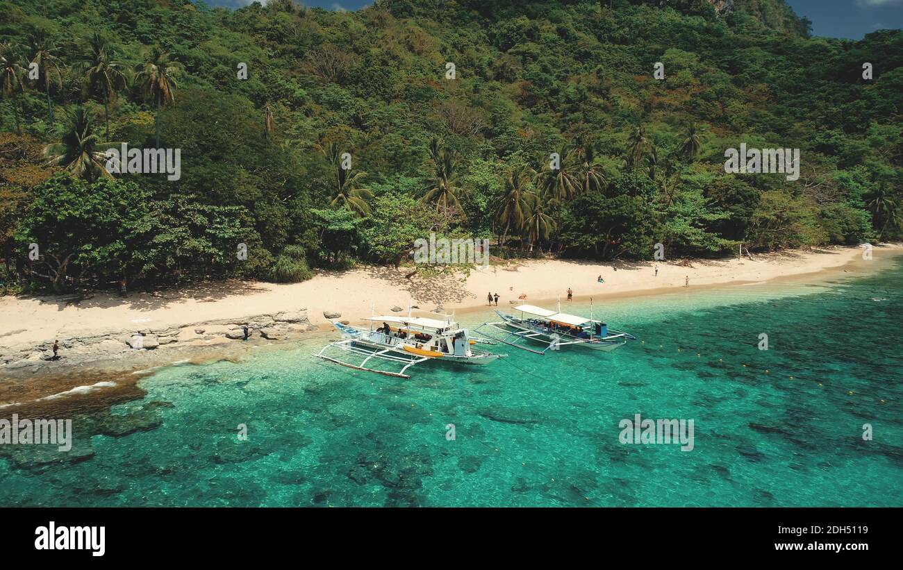 Passenger boats rock ocean shore hi-res stock photography and images ...