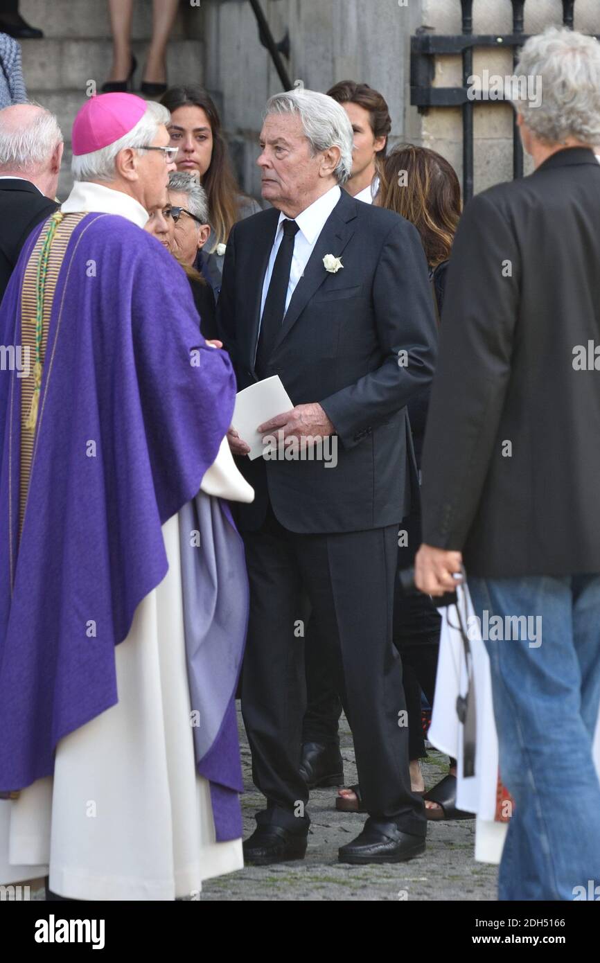 Alain Delon attending the funeral ceremony of French actress Mireille ...