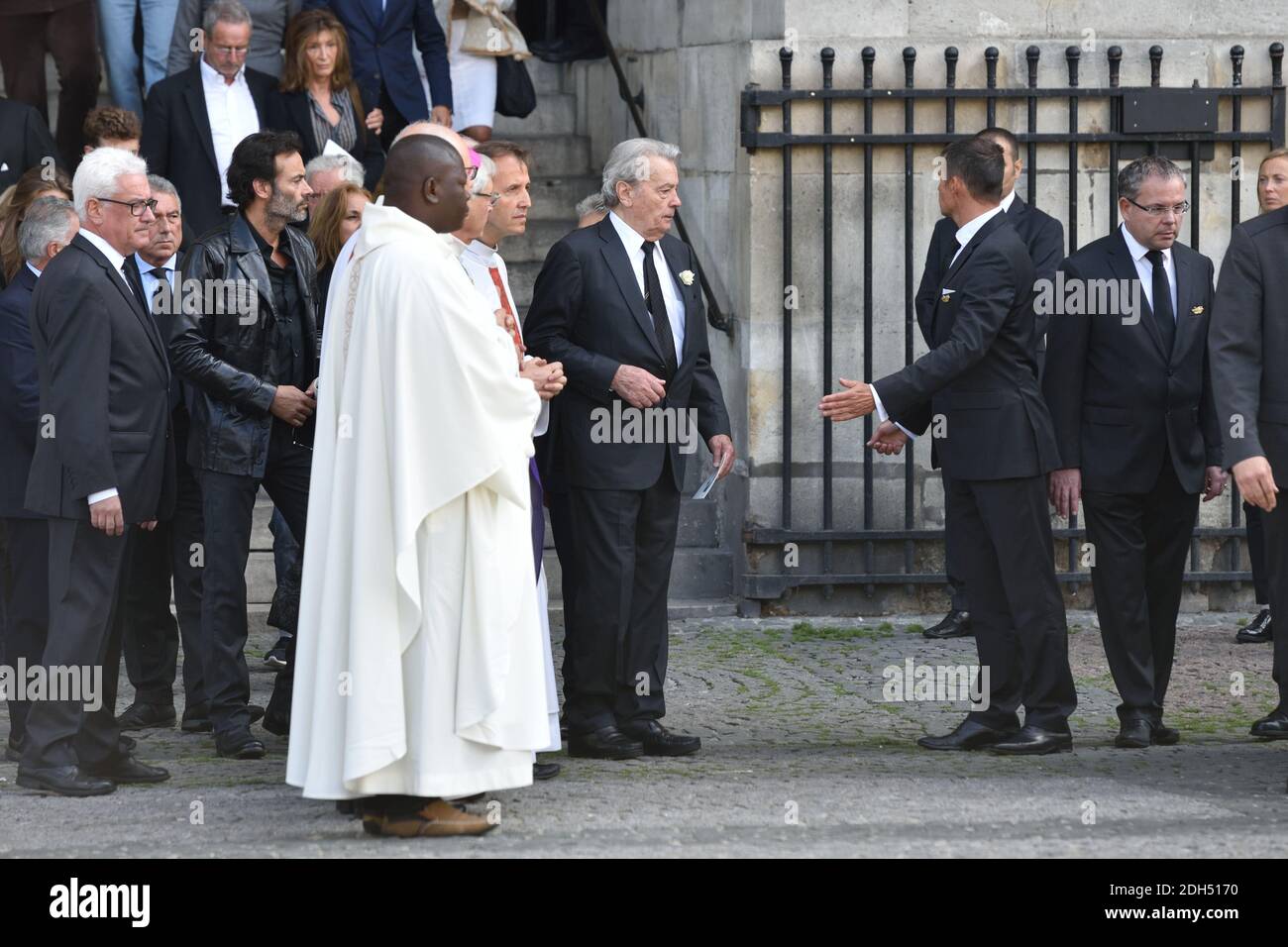 Alain Delon and son Anthony Delon attending the funeral ceremony of ...