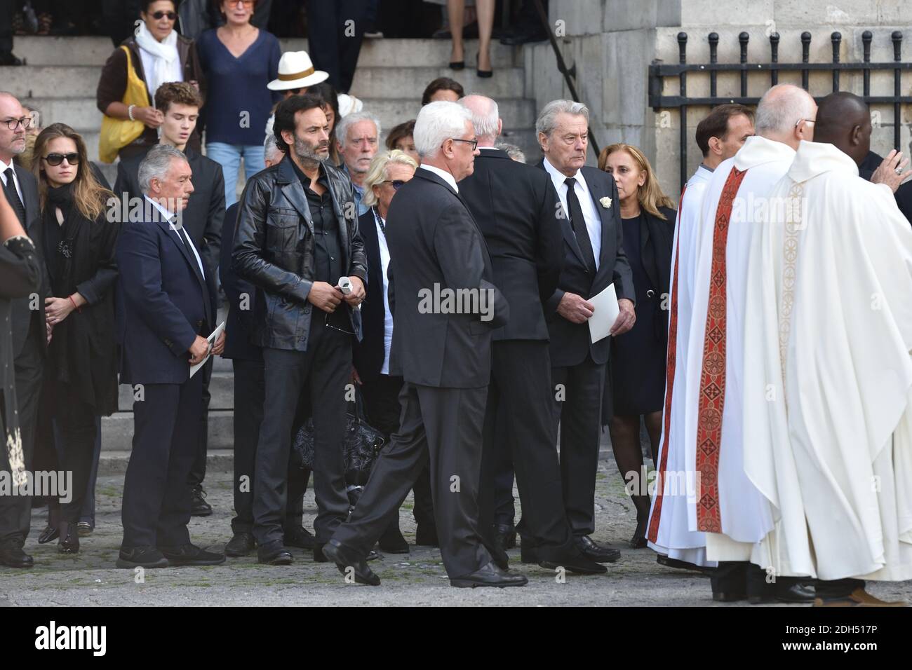 Alain Delon and son Anthony Delon attending the funeral ceremony of ...