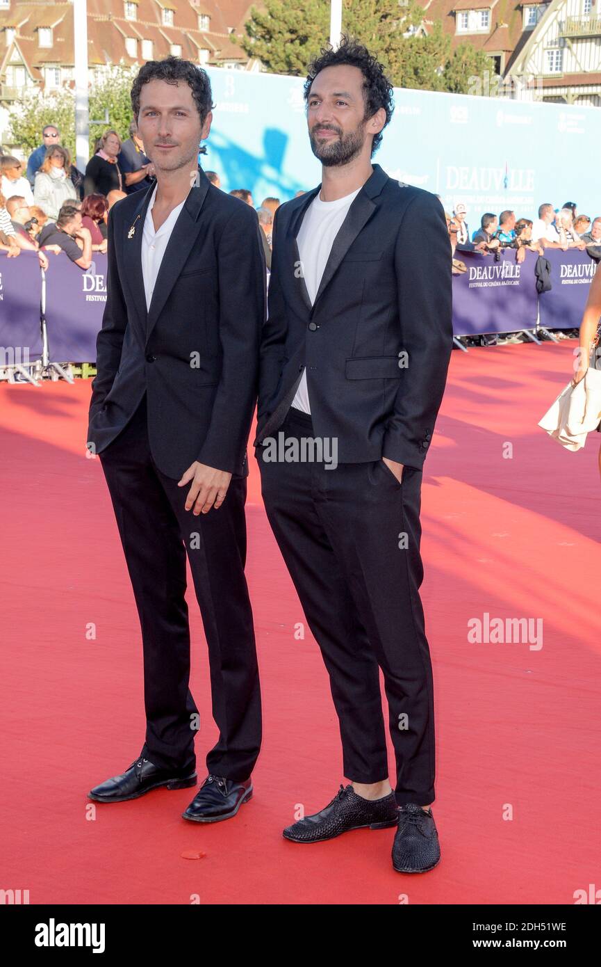 Olivier Coursier and Simon Buret from Aaron band attending the opening ...