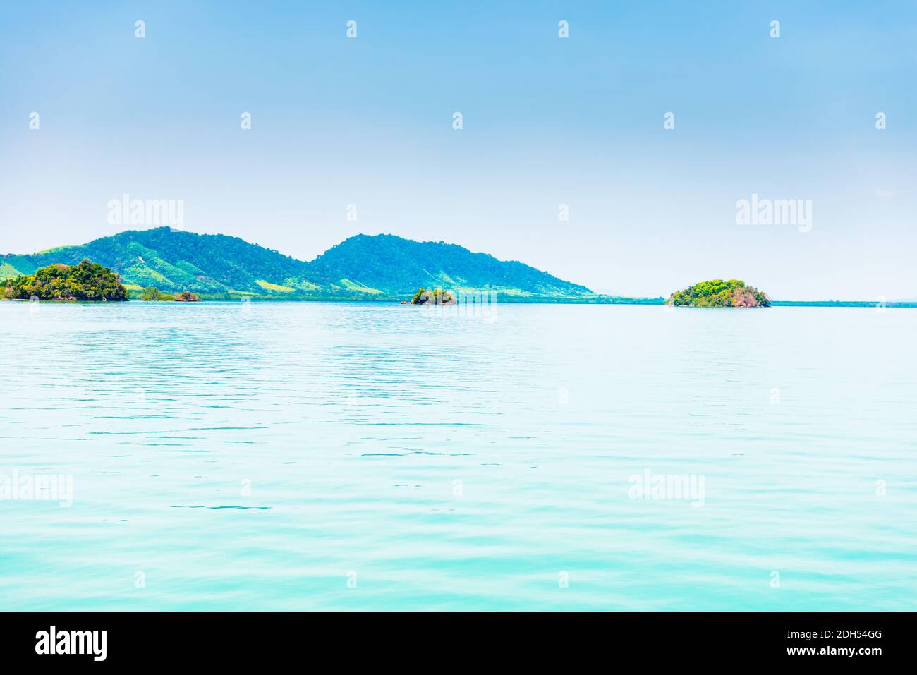 Island in blue sea Stock Photo - Alamy