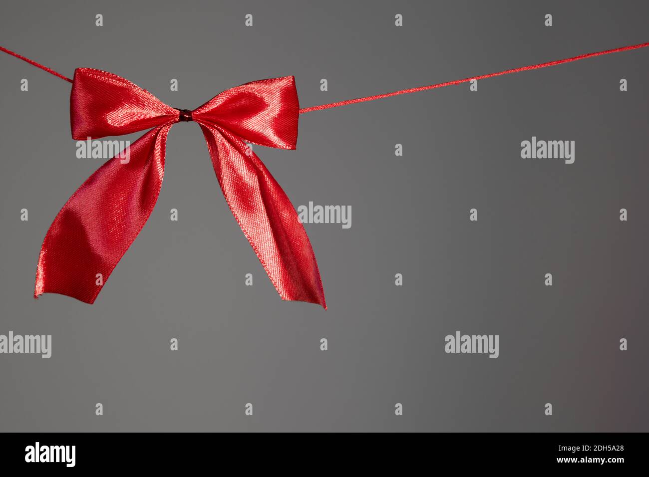 Gray bow hi-res stock photography and images - Alamy