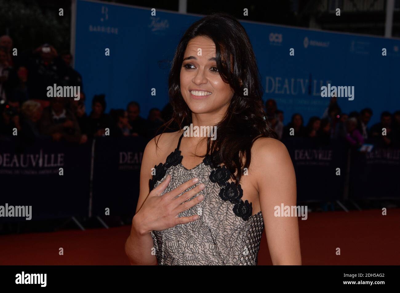 Michelle Rodriguez attending the screening of the movie The Zookeepers ...
