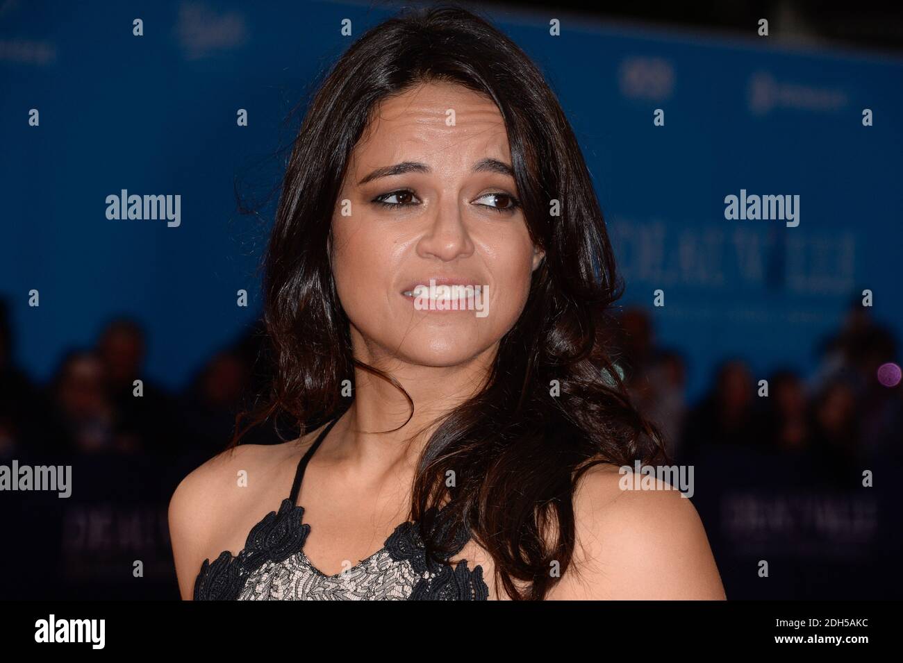 Michelle Rodriguez attending the screening of the movie The Zookeepers ...