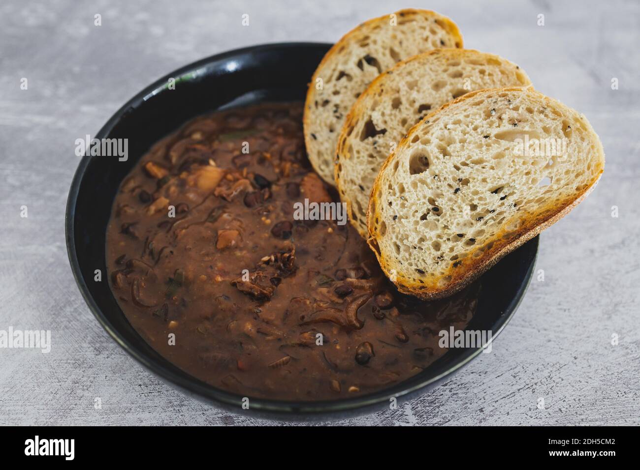 plant-based food, vegan brazilian feijoada with beans and plant-based ...