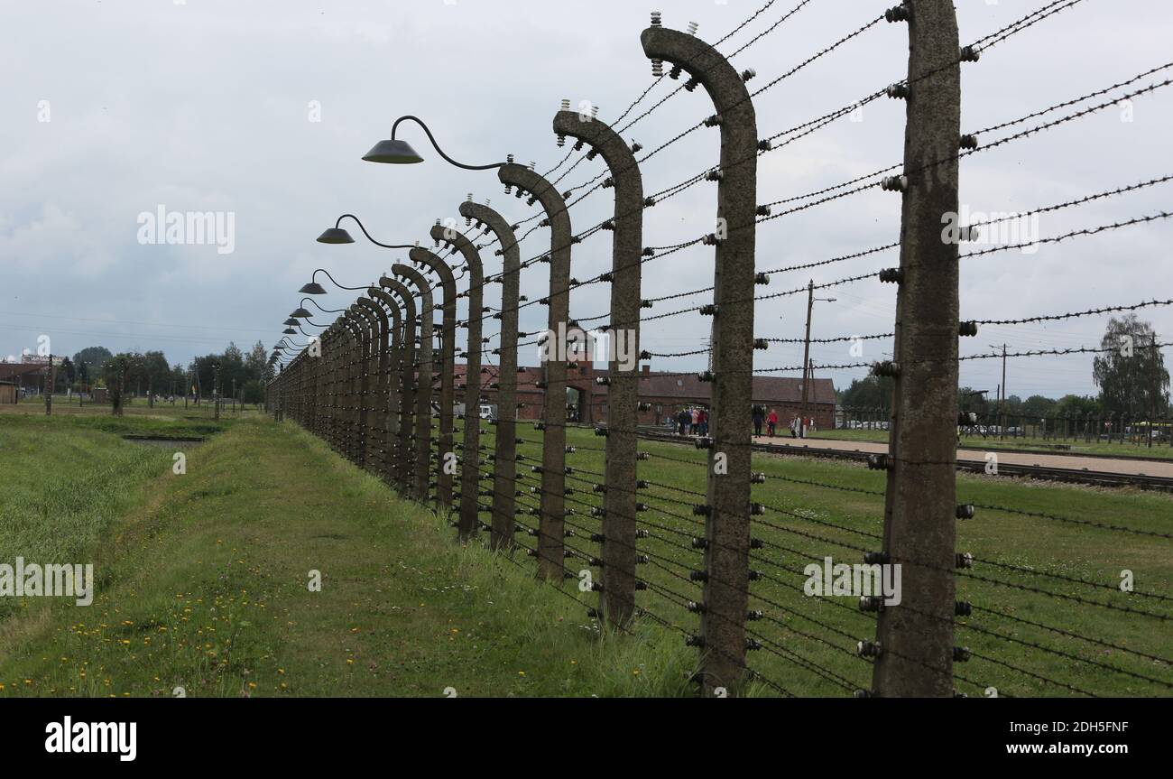 Barbed wire fences at the Auschwitz-Birkenau Nazi concentration camps ...