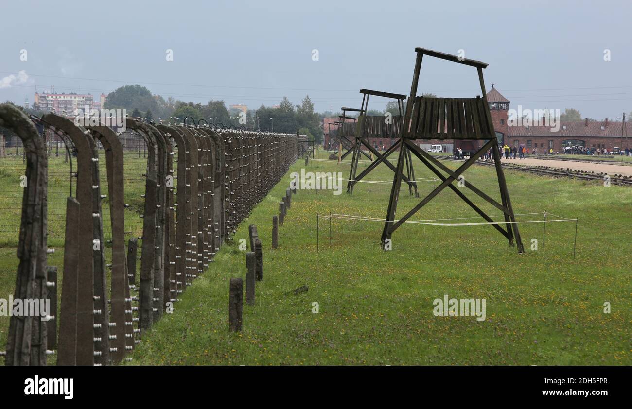 Guard towers and barbed wire fences at the Auschwitz-Birkenau Nazi ...