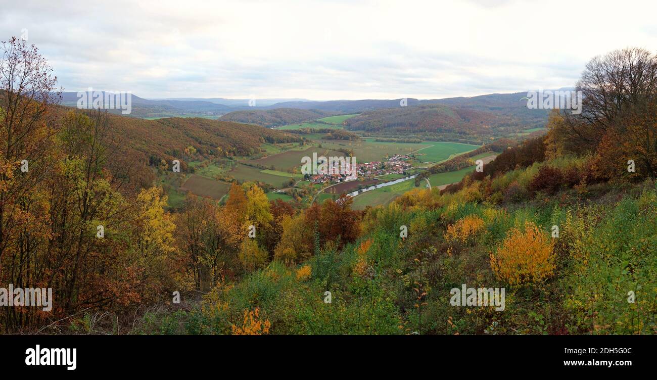 A mesmerizing shot of cozy rural houses in the background surrounded by ...