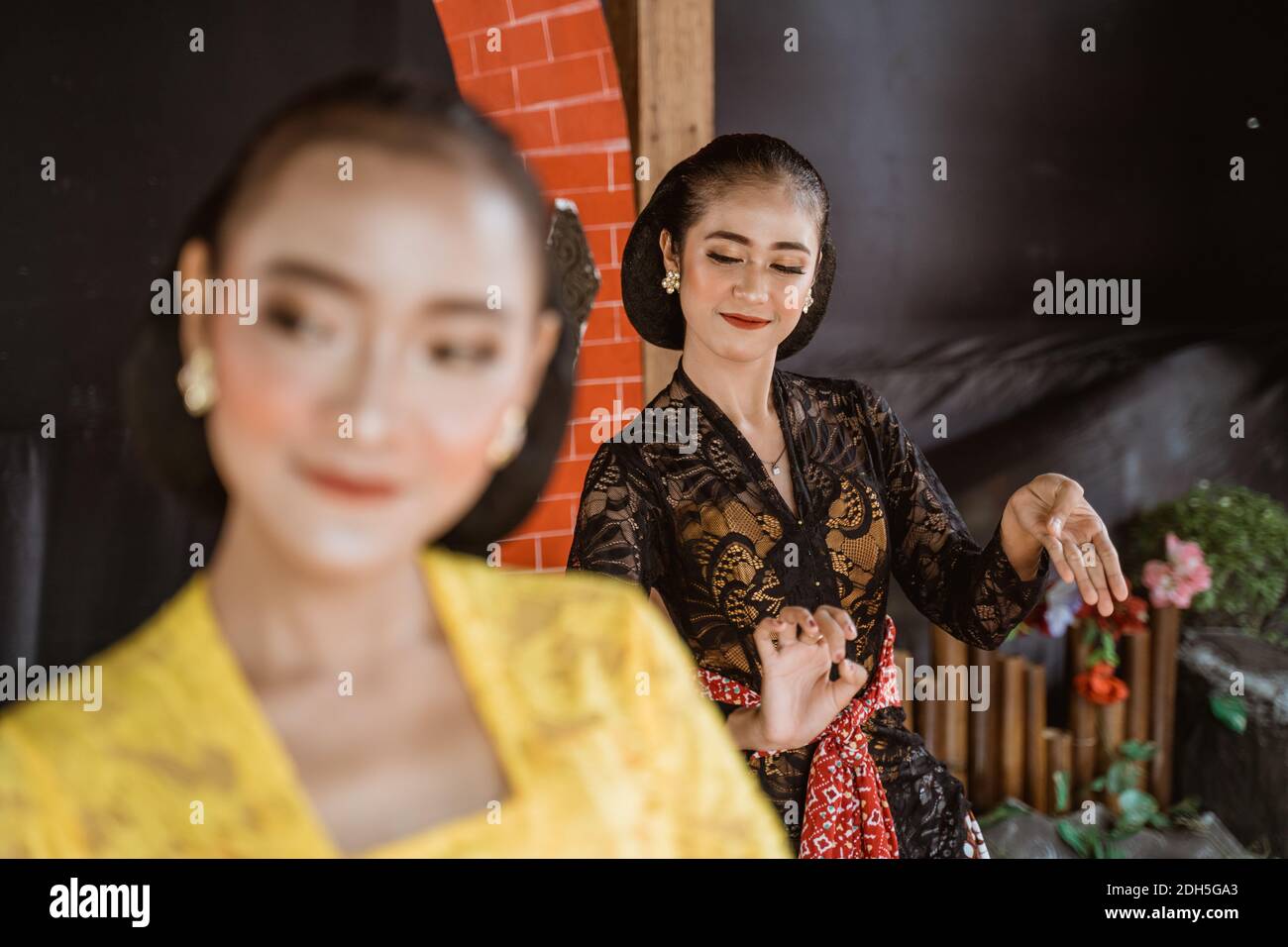 portrait expression young women performing traditional Javanese dancing ...