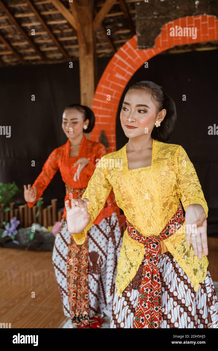 portrait expression young women performing traditional Javanese dancing ...
