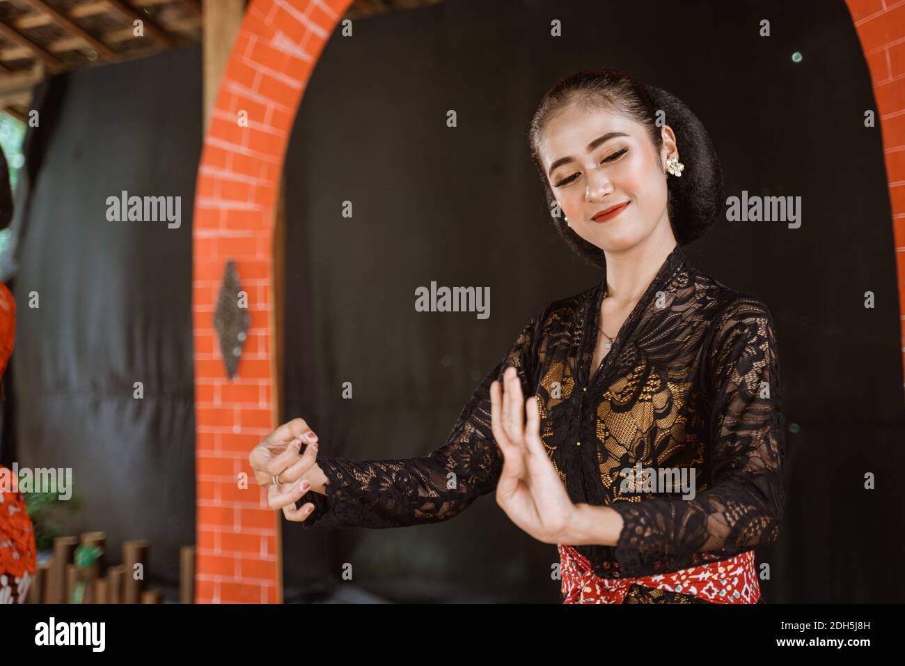 portrait expression young women performing traditional Javanese dancing ...