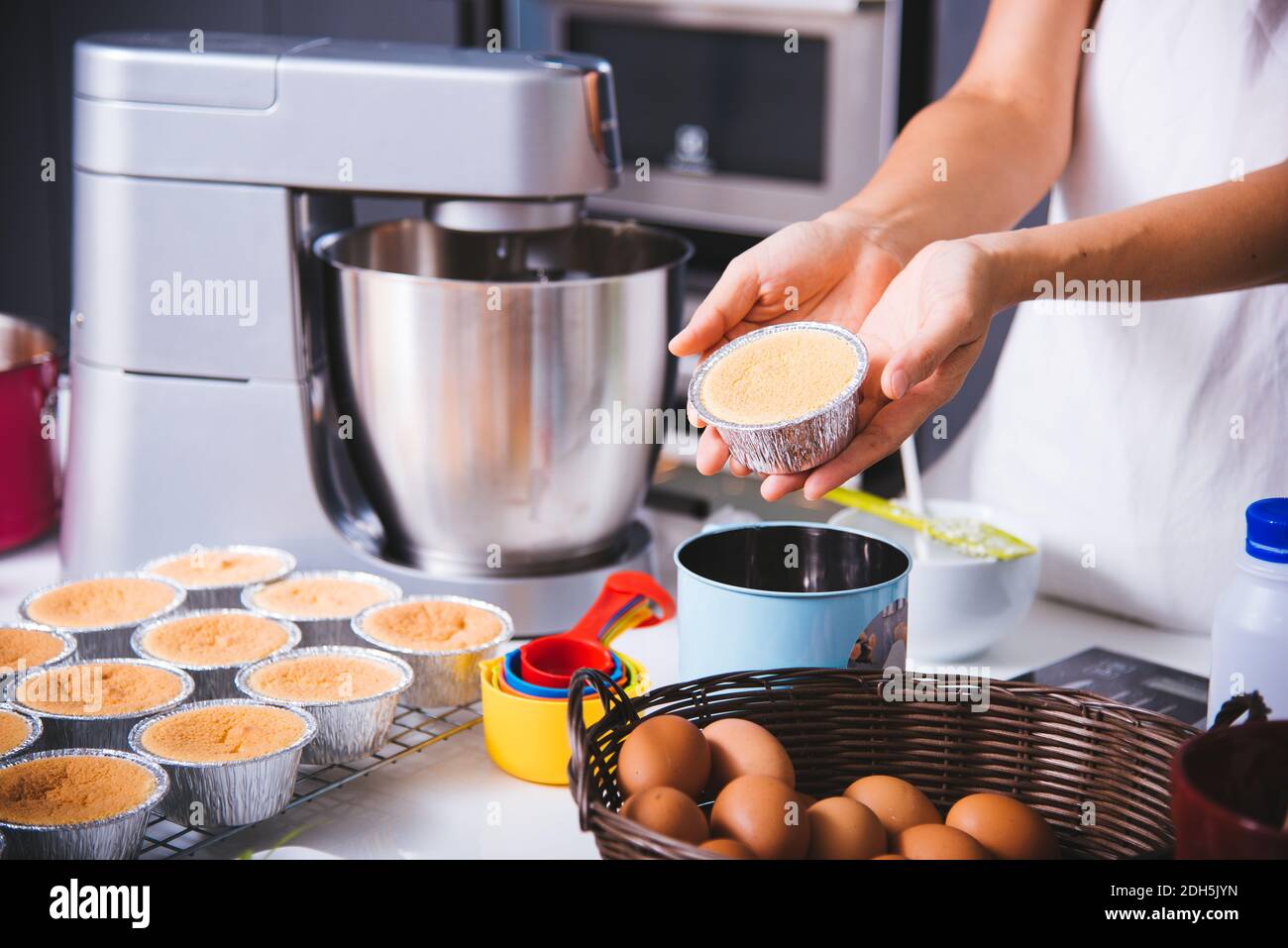 Beautiful woman show bakery cake holding on hands at homemade Stock ...