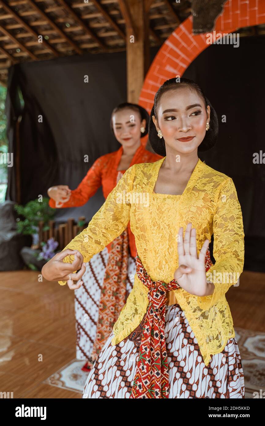 portrait expression young women performing traditional Javanese dancing ...
