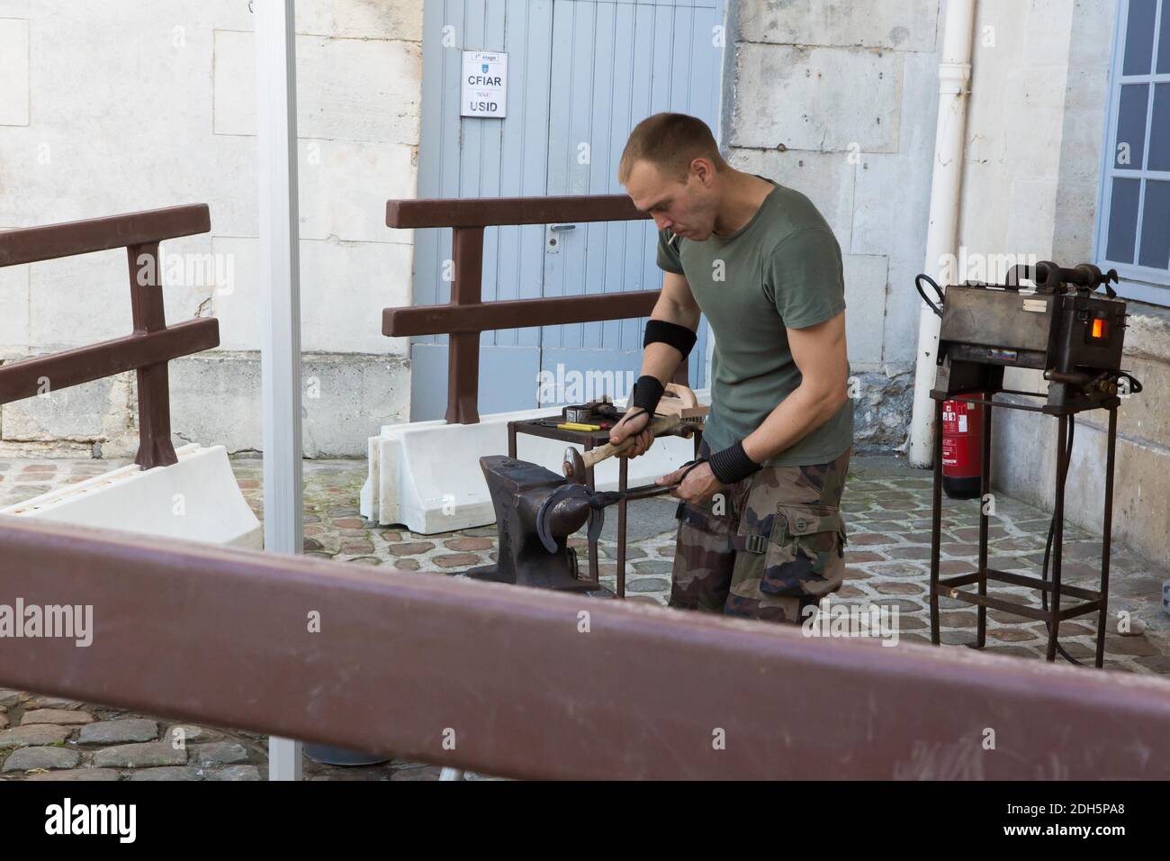 Military blacksmith farrier - Illustration of the Ecole Militaire as ...