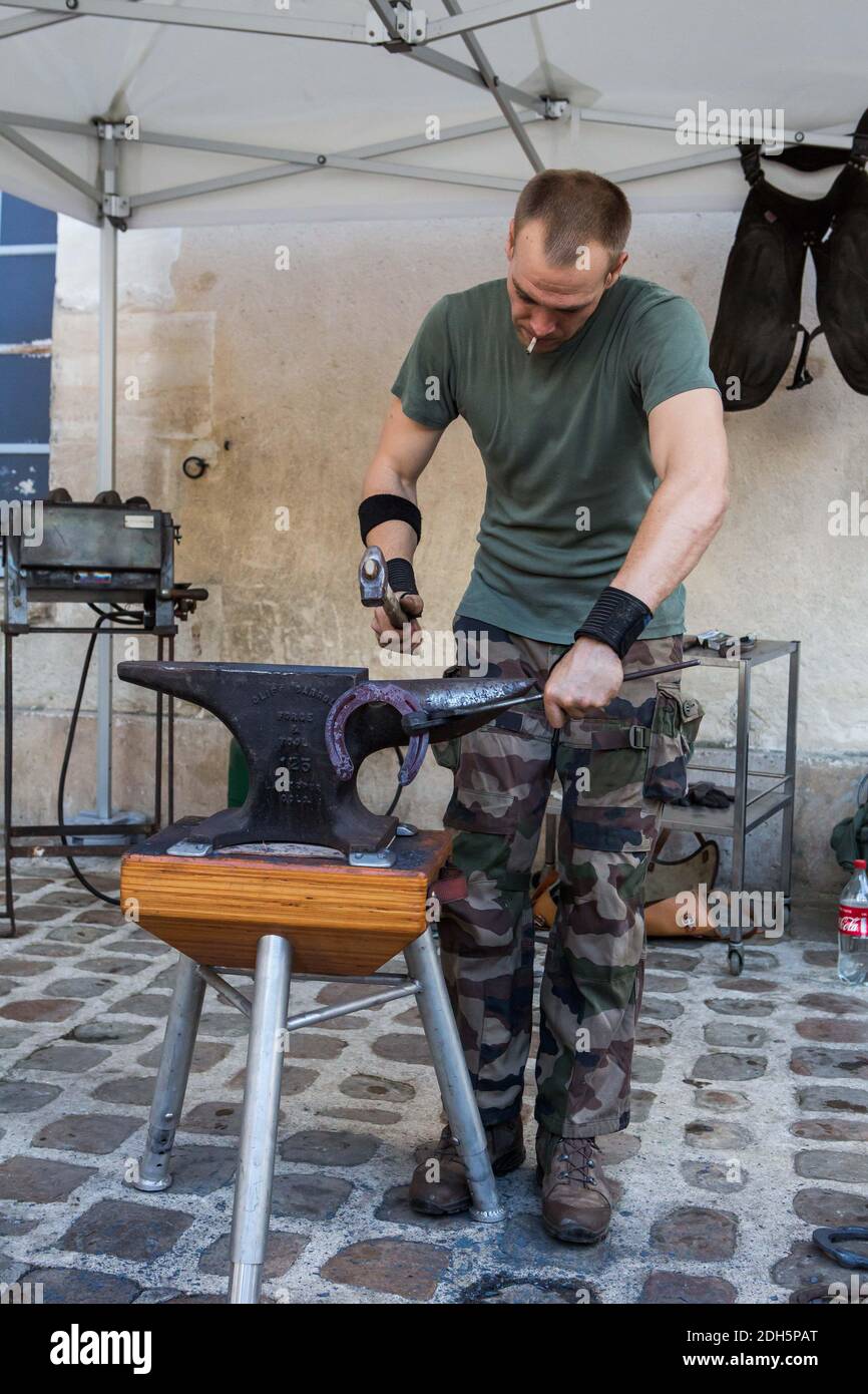Military blacksmith farrier - Illustration of the Ecole Militaire as ...
