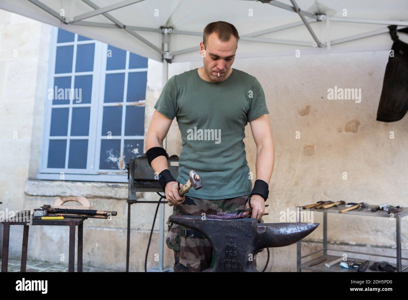 Military blacksmith farrier - Illustration of the Ecole Militaire as ...