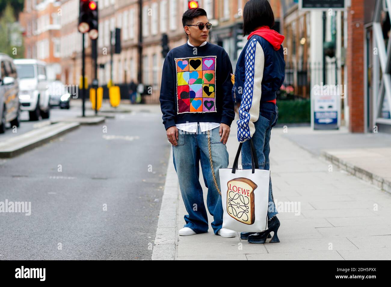 Street style, Bryan Boy and Tiffany Hsu arriving at JW Anderson Spring ...
