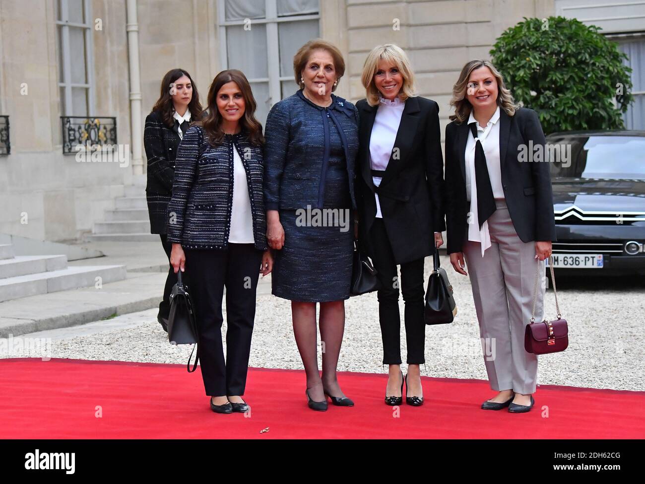 France's first lady Brigitte Macron greets Lebanese President's wife ...