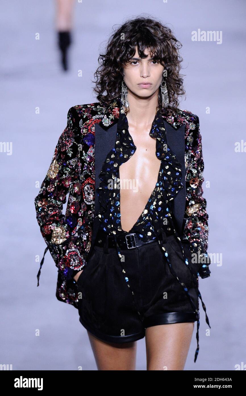A model walks the runway during the Saint Laurent Fashion Show as part ...