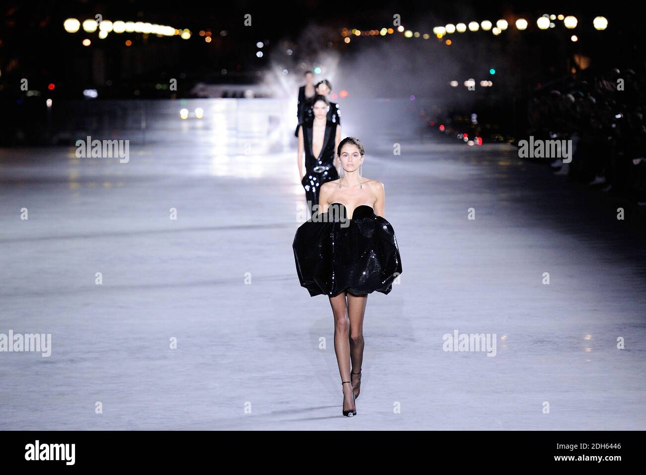 A model walks the runway during the Saint Laurent Fashion Show as part ...