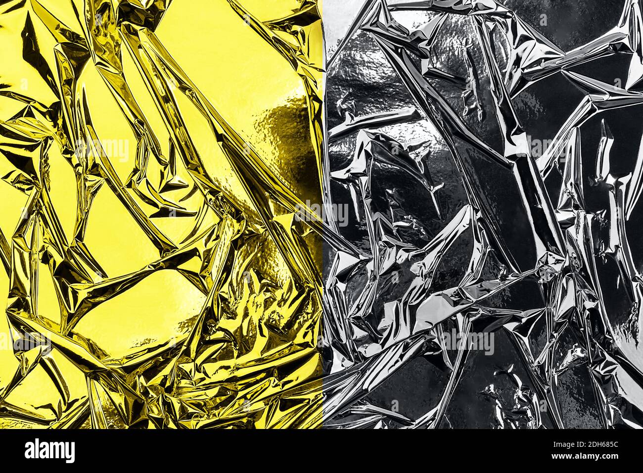 Shiny crumpled surface of trendy yellow and grey foil for textured ...