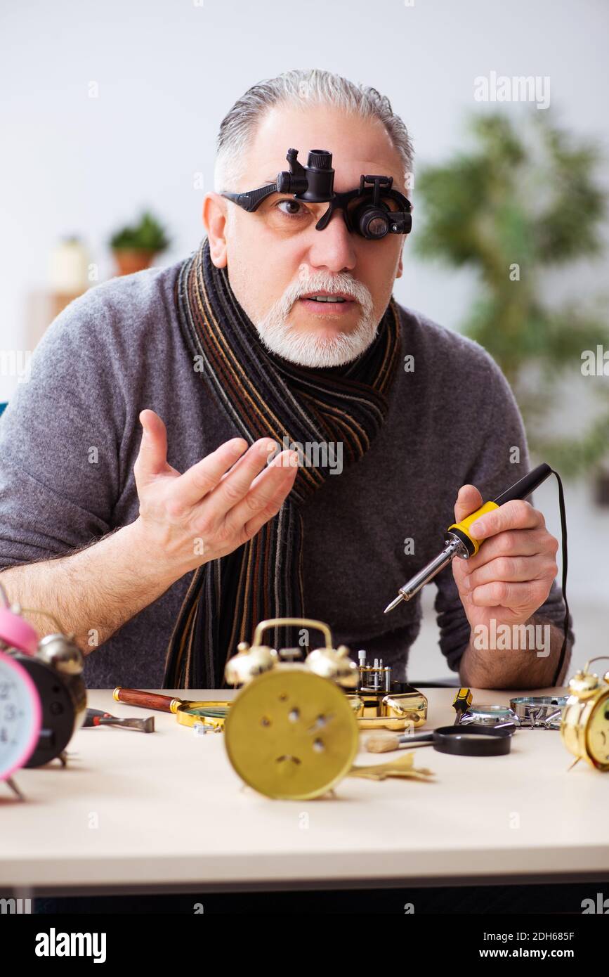 Timepiece maintenance hi-res stock photography and images - Alamy