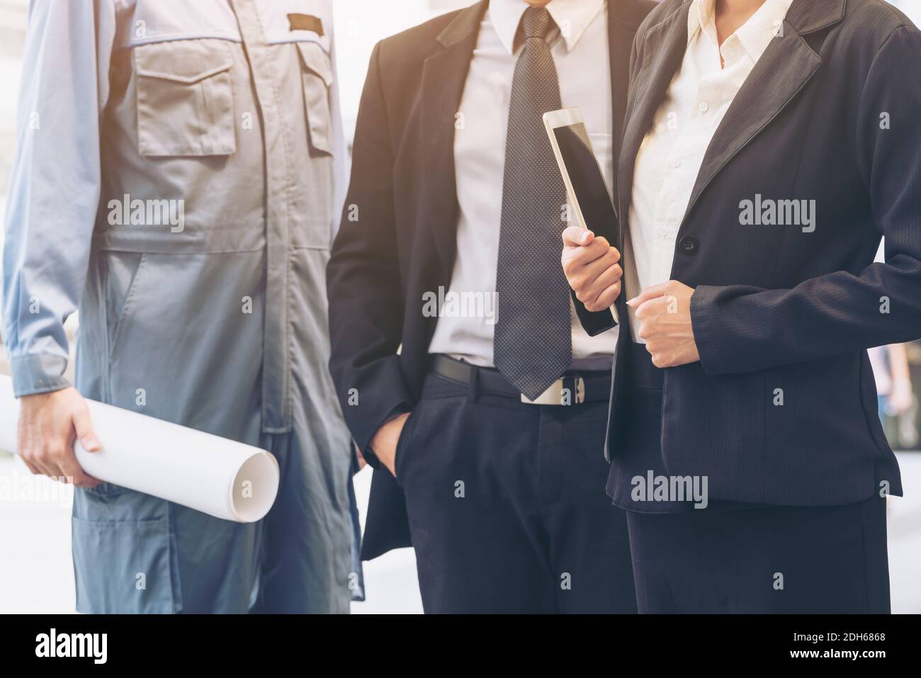 Engineering business team. Engineer, business man and business woman ...