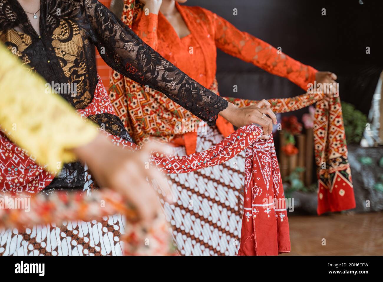portrait young woman presenting traditional Javanese dance movements ...