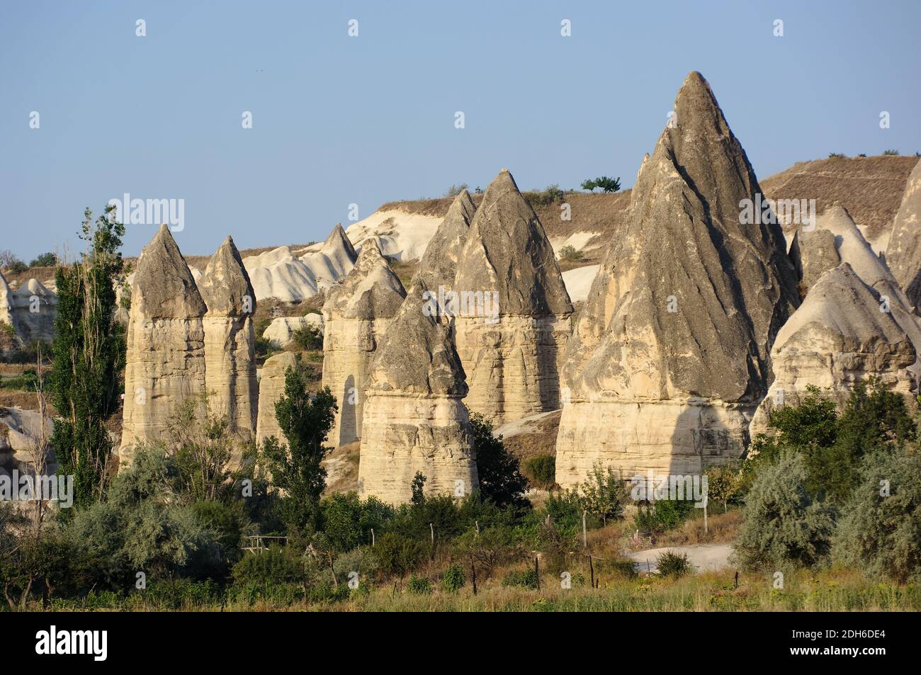 group of fairy chimneys typical rock formation in Goreme, Cappadocia ...