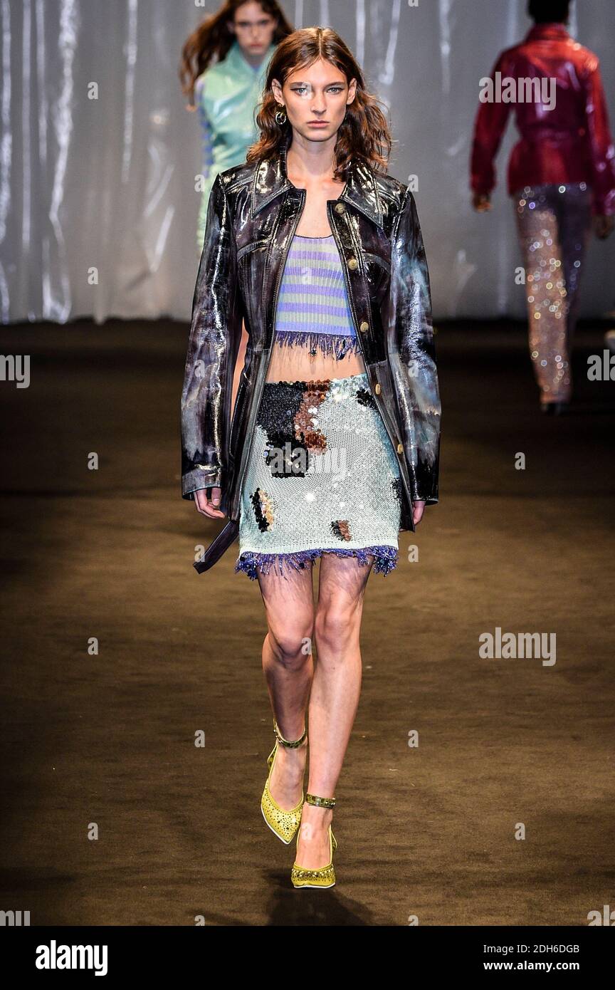 A model walks the runway during the Acne studios show as part of the ...
