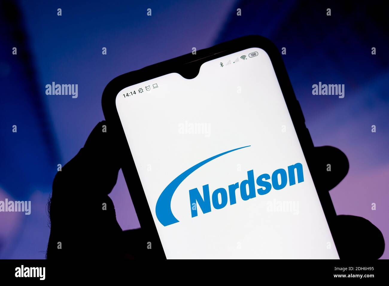 In this photo illustration the Nordson Corporation logo seen displayed ...