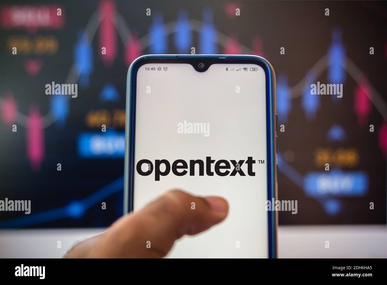 In this photo illustration the OpenText Corporation logo seen displayed ...